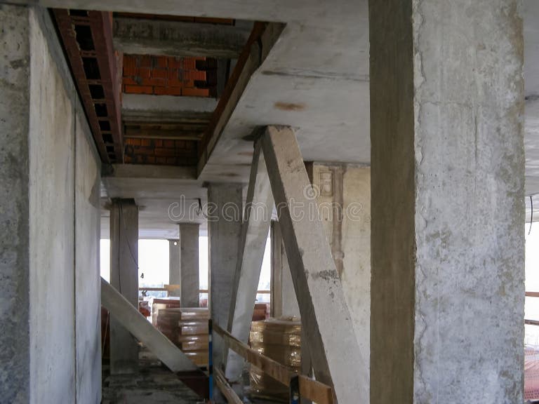 Inside a Building Under Construction, Showing Concrete Columns, Beams, and Brick Elements. Stock ...