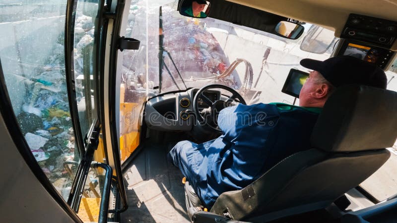 Inside Cab View of a Man Driving a Front Loader, Fast Motion Stock ...