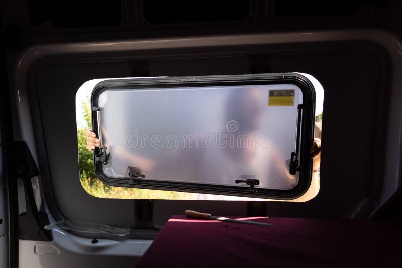Inside a Camper Van - Man Installing a Side Window Stock Photo - Image ...