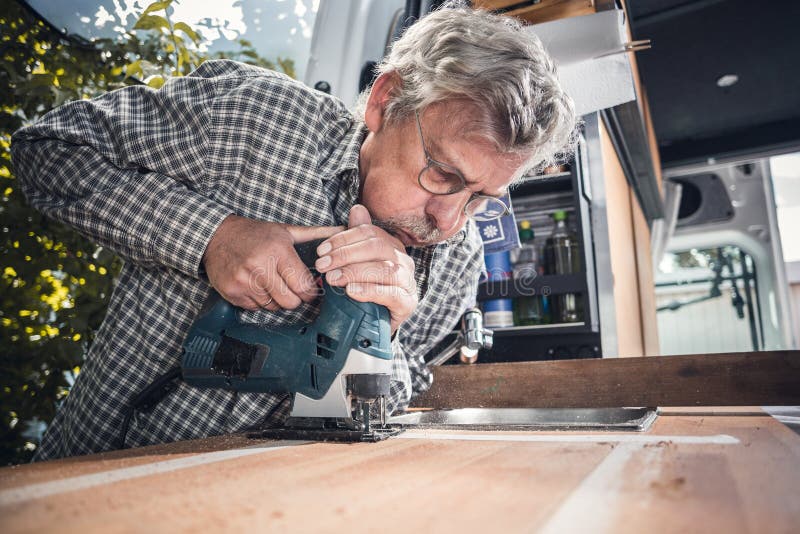 Senior Man Working with a Jigsaw Stock Photo - Image of construction ...
