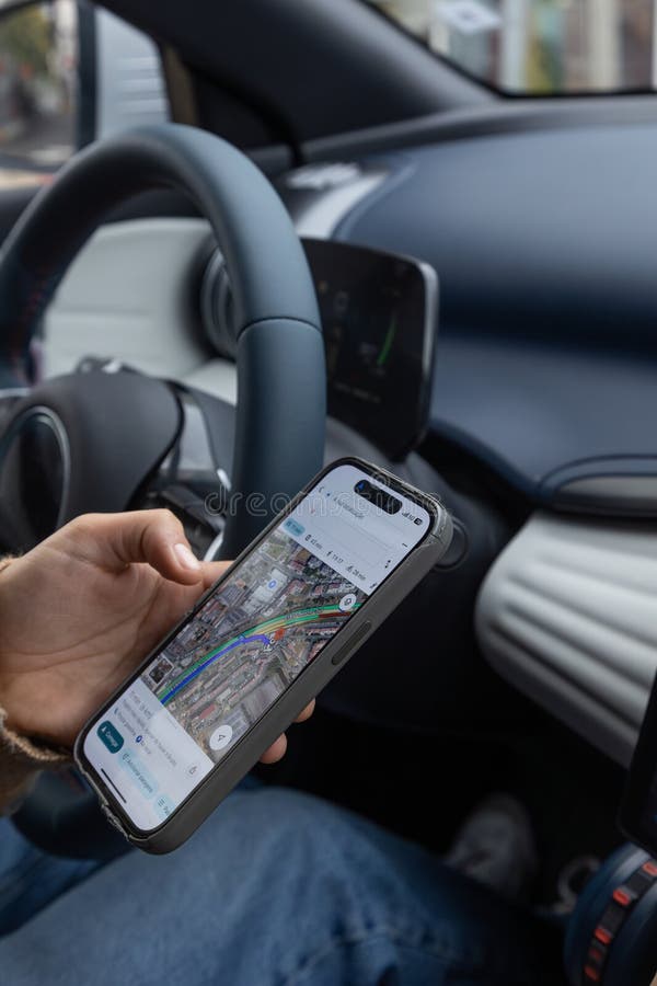 Inside a Car Holding a Smartphone Displaying a Navigation Map App Stock ...