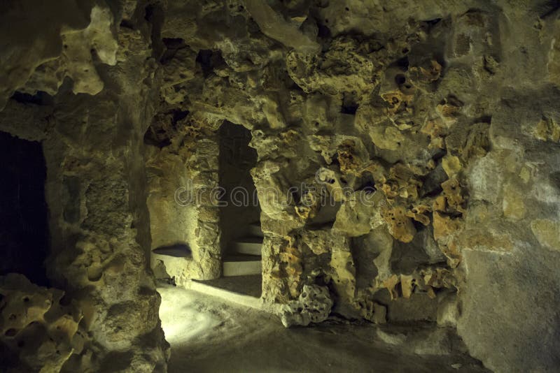 Inside a cave stock image. Image of attraction, path - 128419587