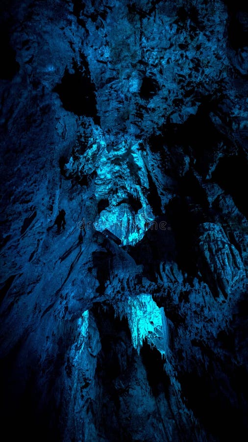 Inside of a Cave Lit Up in Blue Light Stock Photo - Image of rock ...
