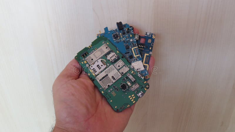 Motherboard of cellphones stock photo. Image of humanhand - 124097400