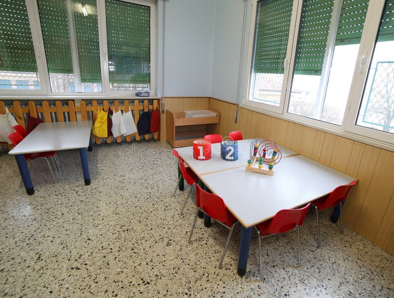 Inside of a Classroom with Chairs and Benches and Some Toys on T Stock ...
