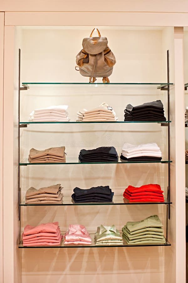 Inside of a clothes shop stock photo. Image of shirt - 46767408