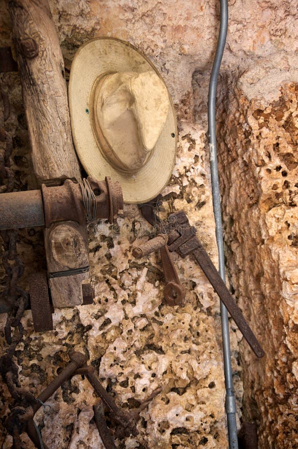 Inside Coral Cave with Work Tools and Hat Stock Image - Image of wall ...