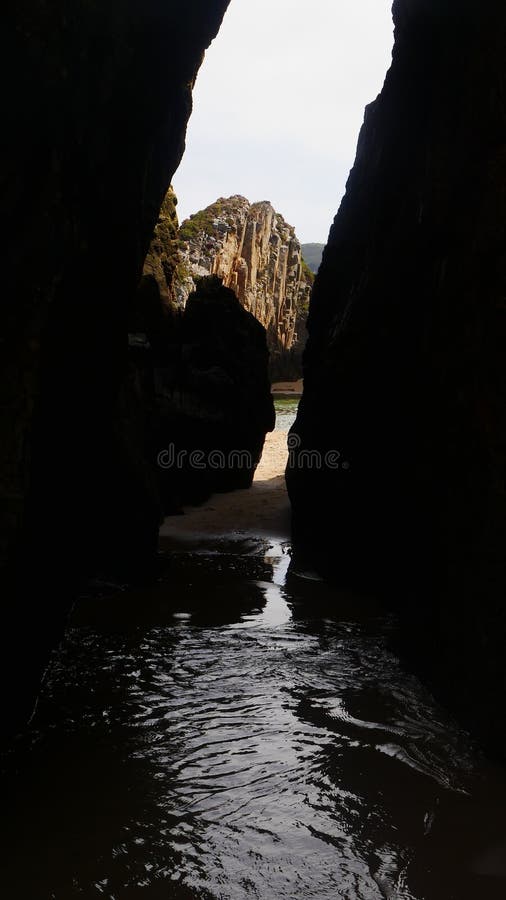 Inside a Cave with Daylight Exit, Ocean View, and Mysterious Reflection ...