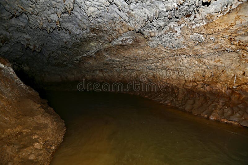 Inside a deep cave stock photo. Image of brown, underground - 81709370
