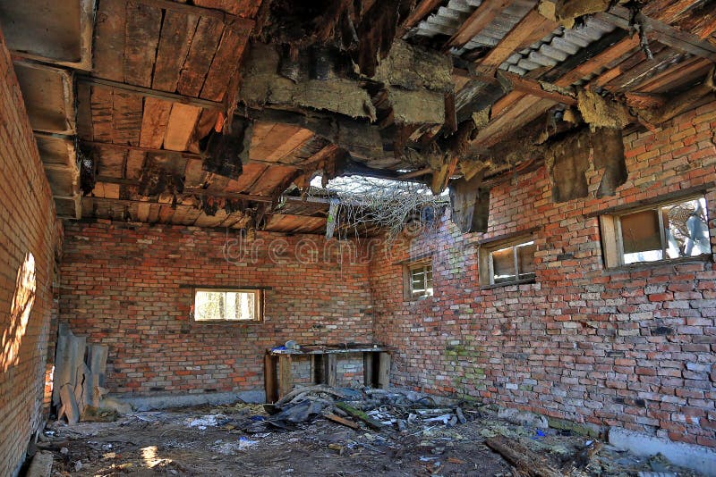 Inside the Destroyed Building. Bomb Pierced the Ceiling Stock Photo ...