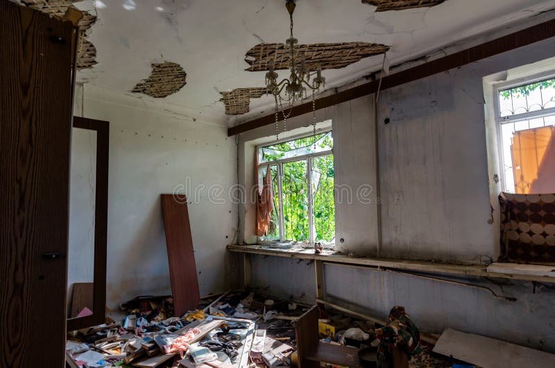 Inside a Destroyed House without People in an Abandoned City in Ukraine ...
