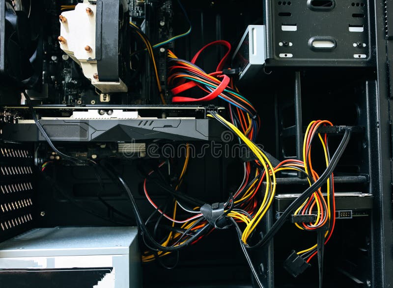 Inside Details of the Personal Computer. Wires. Motherboard and Video ...