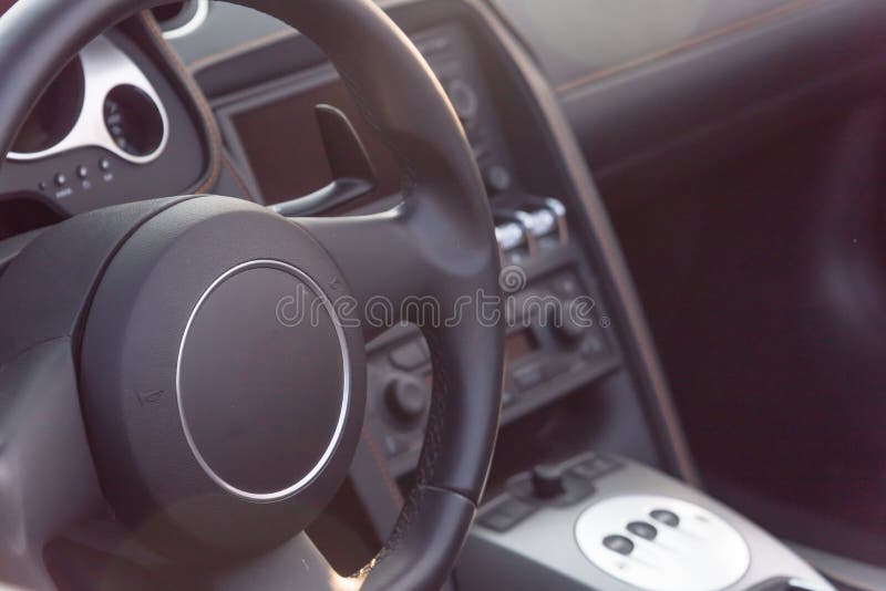 Inside Driver Seat of Super Car with Steering Wheel and Modern Features ...