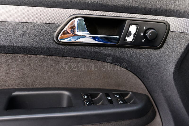 Inside the Drivers Door of a Car with a Window Lifter. Car Door Handle ...