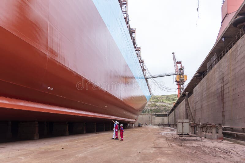 Inside Dry Dock, View on the Bottom Part of the Big Container Ship ...