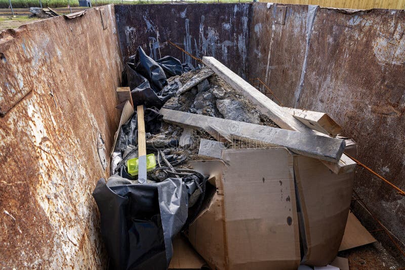 Home Building Site Dumpster Stock Image - Image of rusted, rusty: 220283057