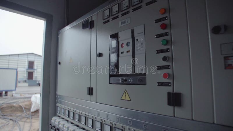 Inside of Electrical Control Panel with Multiple Switches, Wires, Short ...