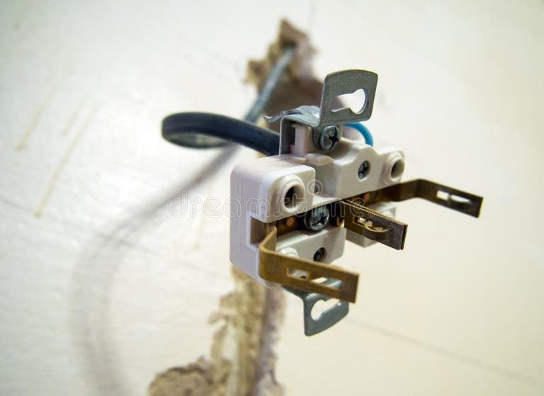 The Inside of the Electrical Outlet is Hanging on the Cable Stock Photo ...