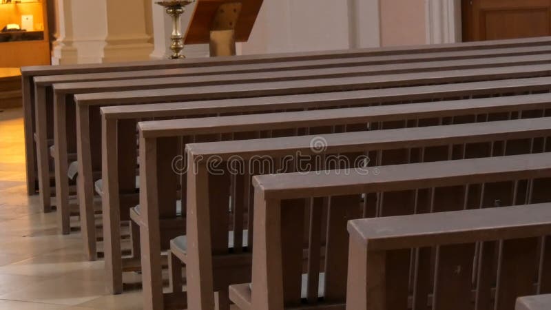 Inside an Empty Catholic Church. Wooden Pews for Church Members and the ...