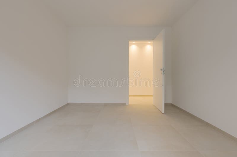 Inside an Empty Room and To the Right a Door Leading To the Corridor ...