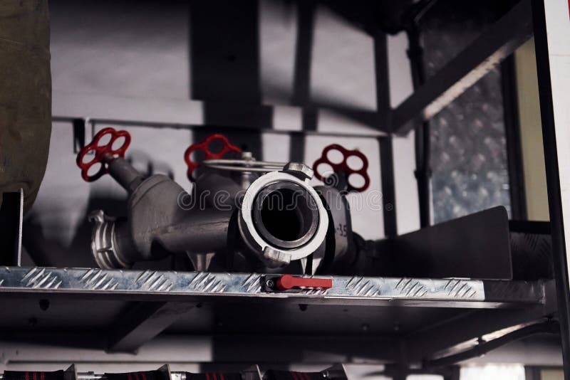 Inside of Fire Truck. Close Up View of Equipment and Hoses Stock Photo ...