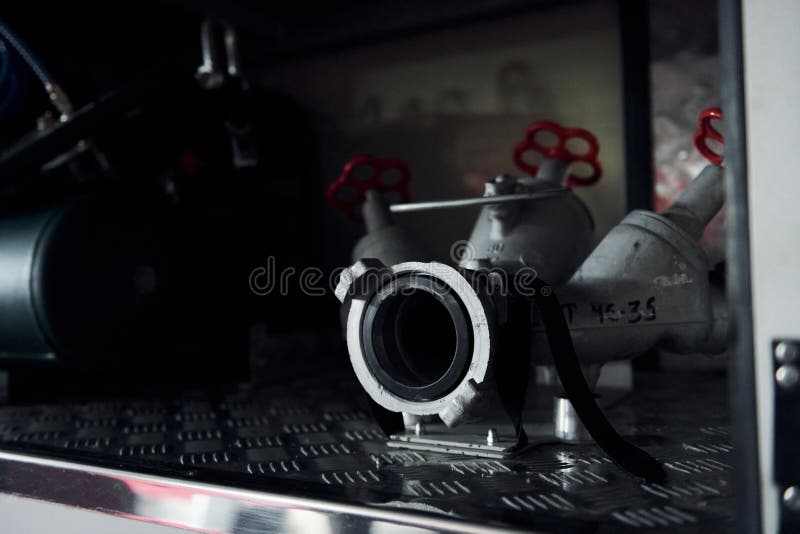 Inside of Fire Truck. Close Up View of Equipment and Hoses Stock Image ...