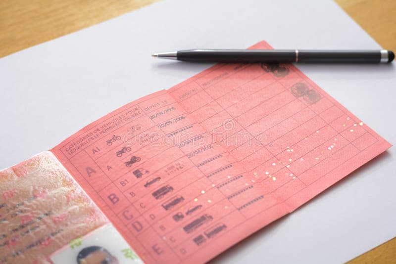 Inside a French Driver Licence with a Pen Stock Photo - Image of ...
