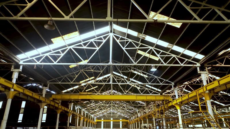Inside Huge Manufacturing Warehouse with Dramatic Sunlight and Iron ...