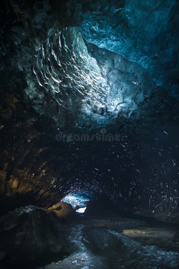 Inside ice cave tunnel stock photo. Image of caving - 181168332