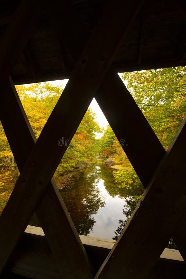 Inside Keniston Covered Bridge in New Hampshire, with Fall Colors Stock ...