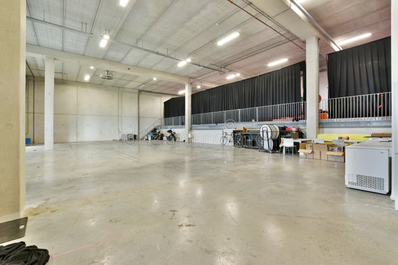 The Inside of a Large Building with a Concrete Floor Editorial Image ...