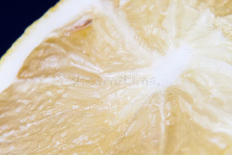 Lemon Sectioned In Half With Seed In Sight On Abstract Background Stock ...