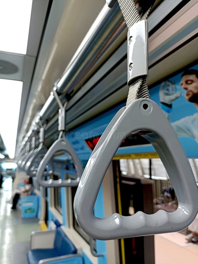 A Row Plastic Hand Holders Inside Light Rail Transit LRT in Jakarta ...