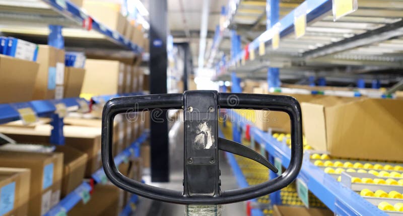 Inside a Logistics and Distribution Warehouse with Packages in a Long ...