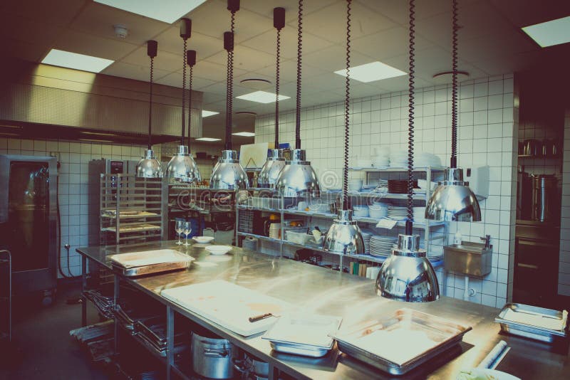 Inside Look of a Restaurant Kitchen with Metal Trays on the Table and ...