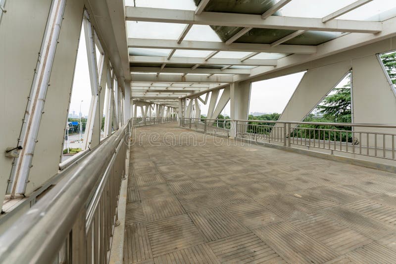 Inside of a Modern Overhead Pedestrian Bridge Stock Photo - Image of ...
