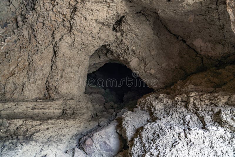 Inside a mountain cave stock photo. Image of abandoned - 211208520