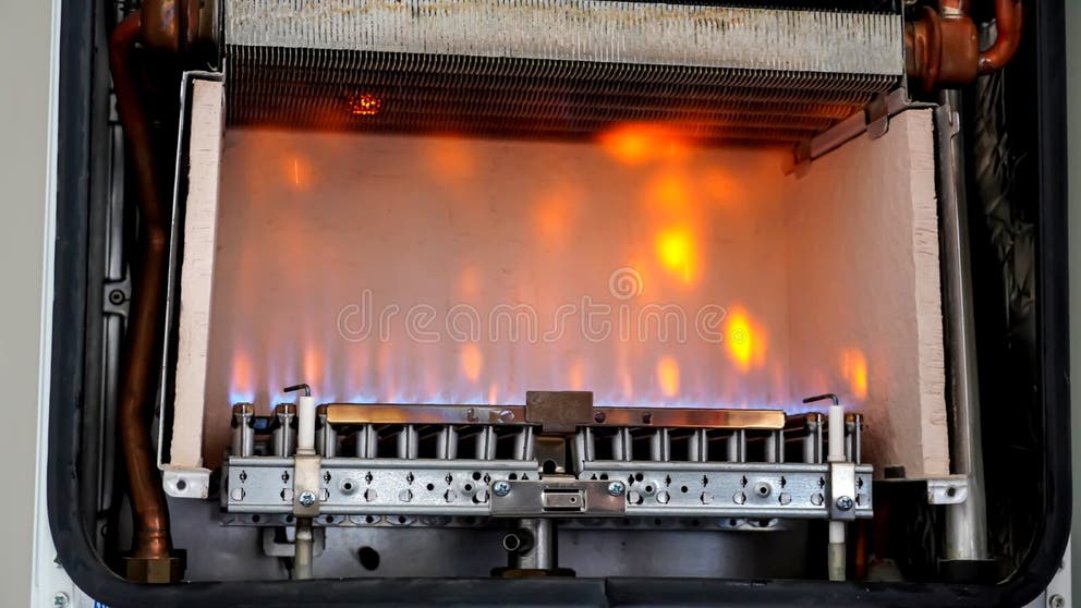 Inside of a Natural Gas Combi Boiler that is Working Stock Photo ...