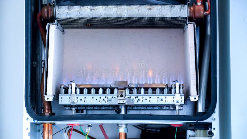 Inside of a Natural Gas Combi Boiler that is Working Stock Photo ...