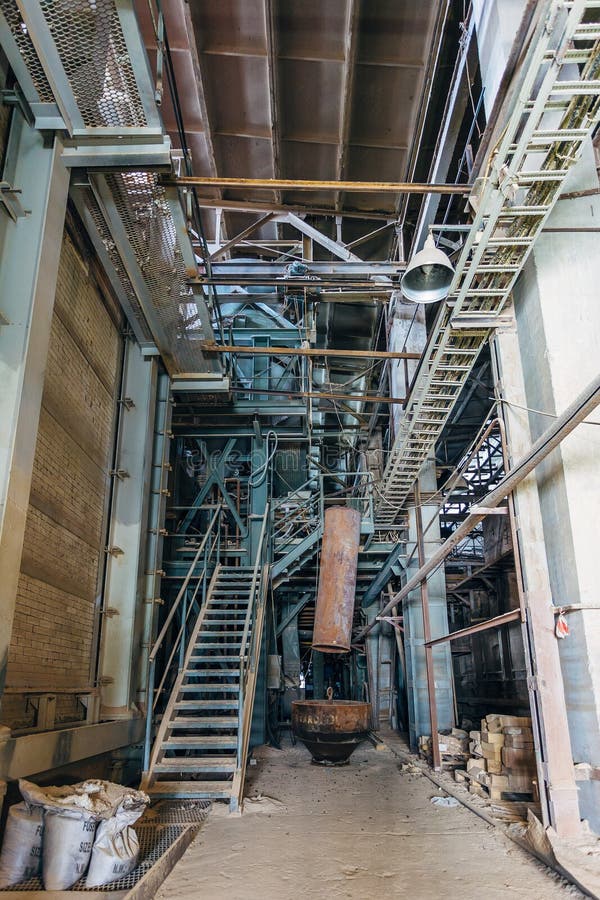 Inside of Old Abandoned Factory. Rusty Ruined Industrial Equipment ...