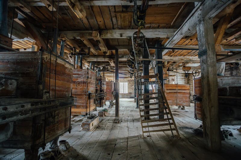 Inside Old Abandoned Wooden Mill with Old Equipment Stock Image - Image ...