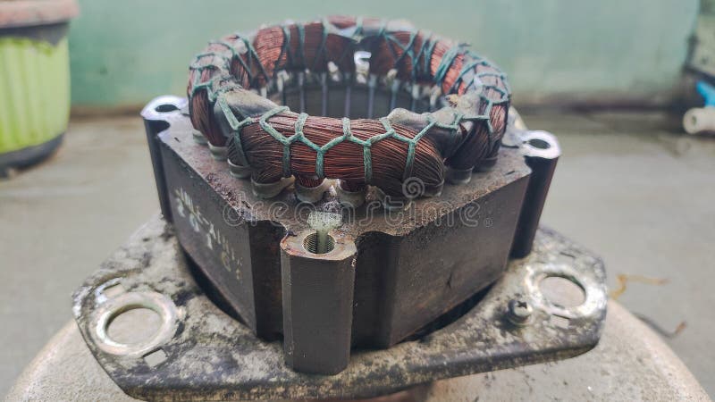 The Inside of the Old and Rusty Dynamo is a Coil of Wire on the Dynamo ...