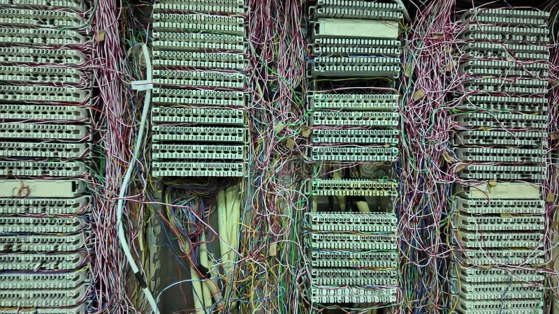Inside a PABX Telephone Booth that Has a Number of Connecting Cables in ...