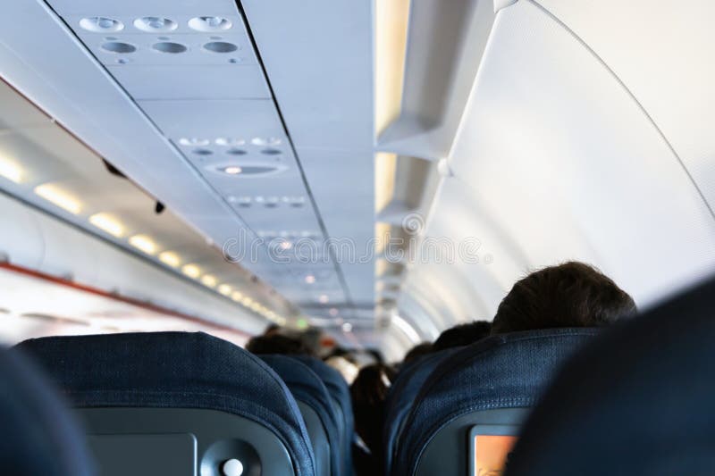 Inside the Passenger Plane Cabin with People. Stock Photo - Image of ...