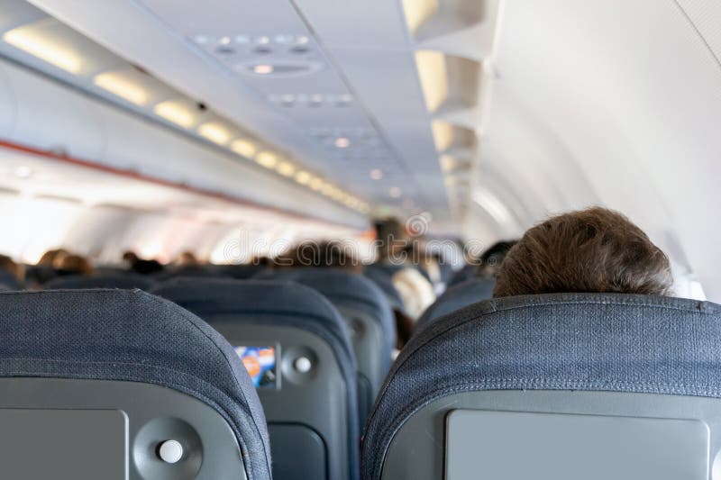 Inside the Passenger Plane Cabin with People. Stock Photo - Image of ...