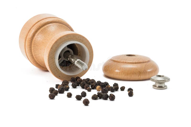 Wood Pepper Mill on a Taule Stock Image - Image of dark, metal: 75352913