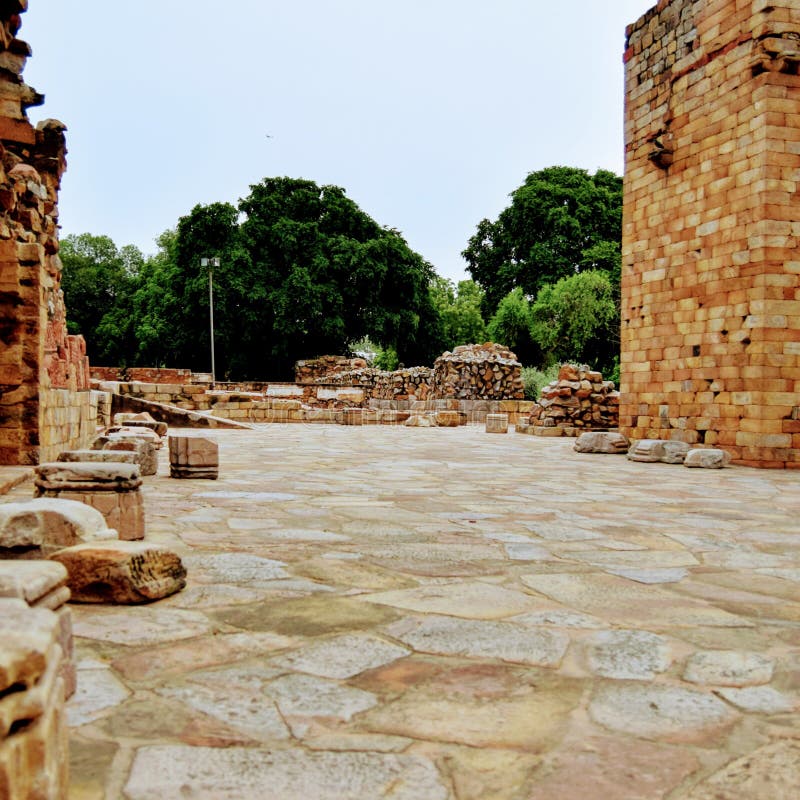 Inside the Qutub Minar Complex with Antic Ruins and Inner Square ...