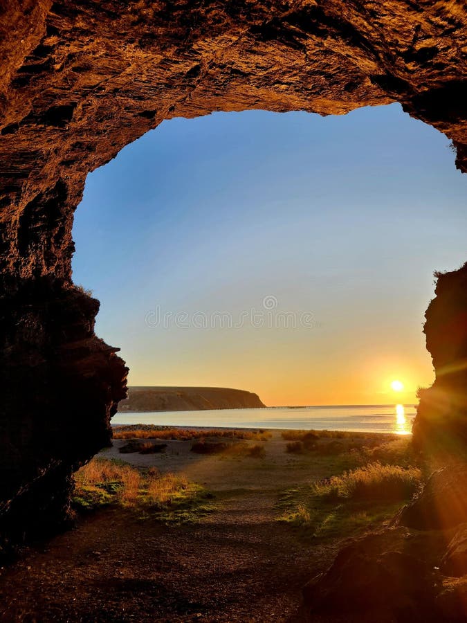 Inside Rapid Bay Cave at Sunset Stock Photo - Image of ocean, rapid ...