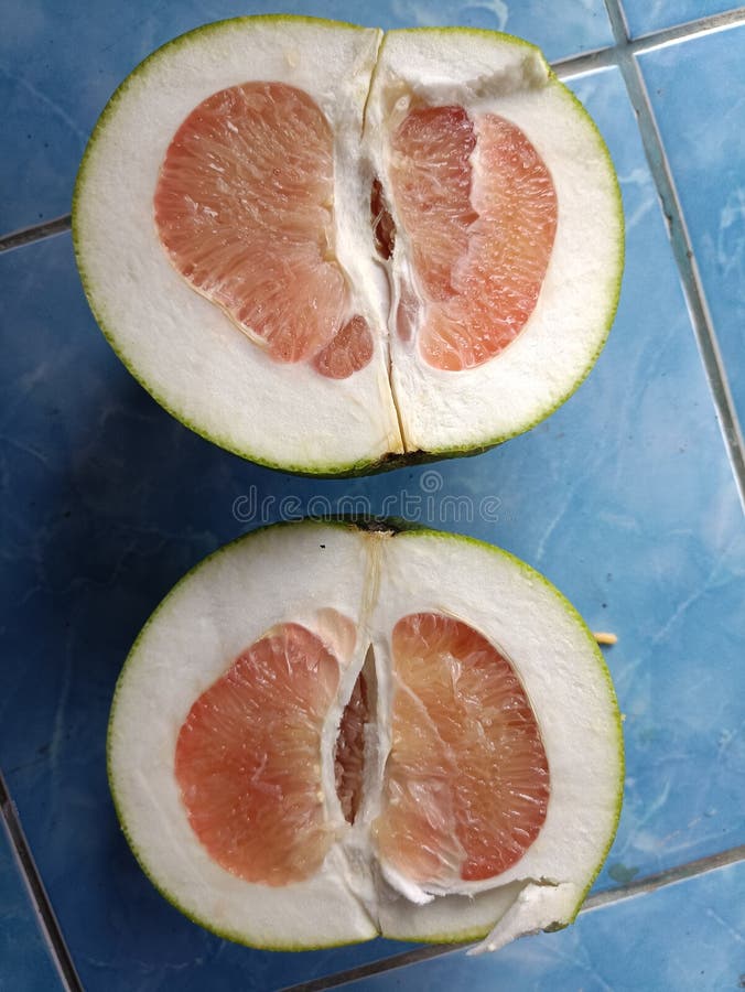 The Inside of a Ripe Grapefruit when Cut in Half Stock Photo - Image of ...