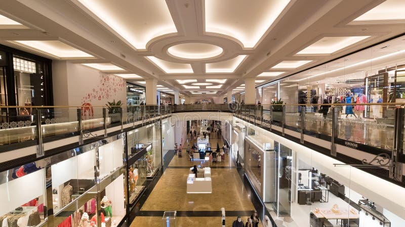 A Shopping Mall with Bright Lights of the Stores in Dubai, UAE ...